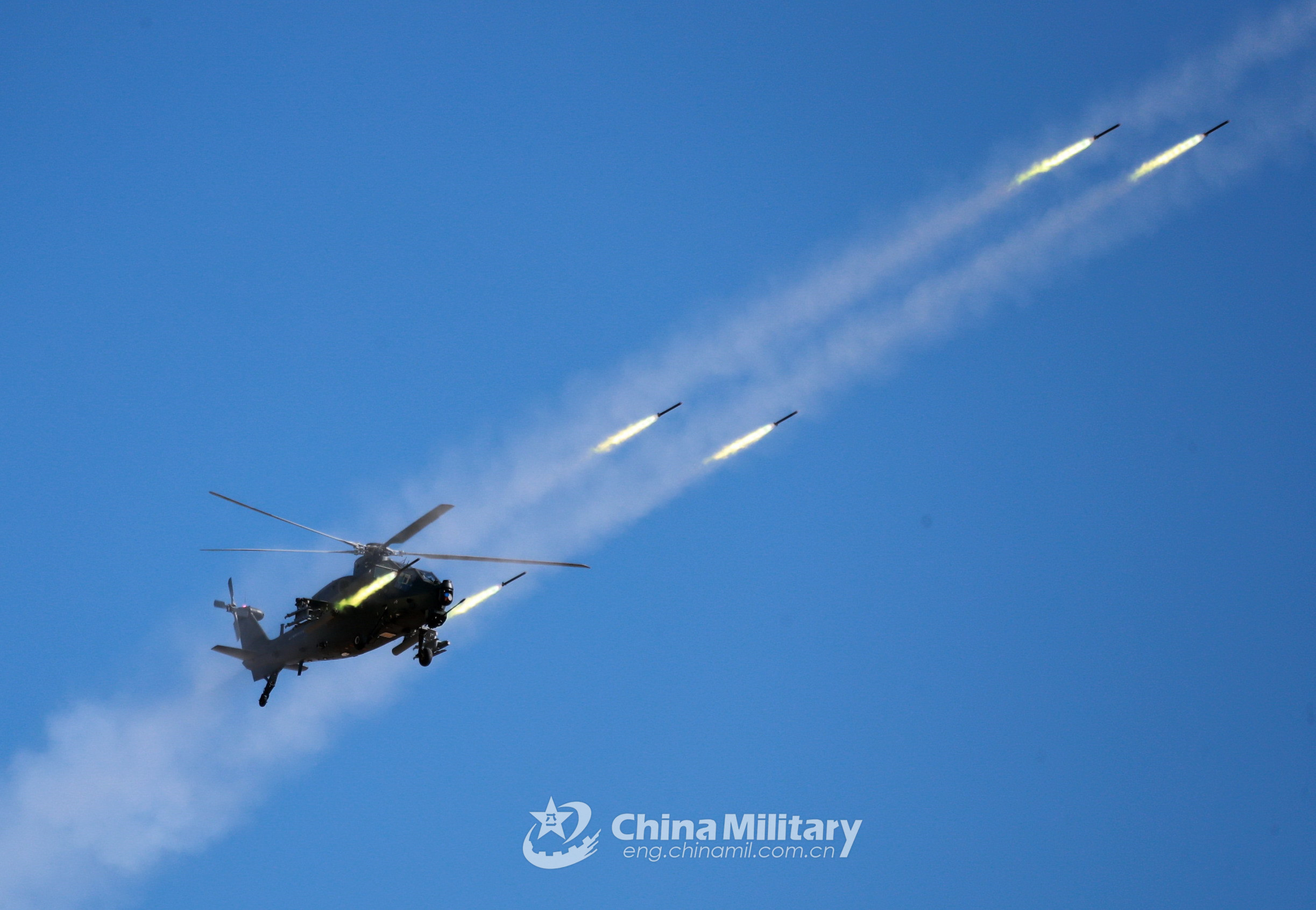 Multi-type attack helicopters fire rockets - China Military